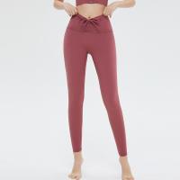 China Spot wholesale bowknot drawstring yoga pants women high waist hip lift sports pants tight fitness pants trousers women for sale
