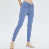 China Spot wholesale bowknot drawstring yoga pants women high waist hip lift sports pants tight fitness pants trousers women for sale