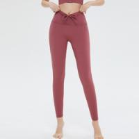 China Spot wholesale bowknot drawstring yoga pants women high waist hip lift sports pants tight fitness pants trousers women for sale