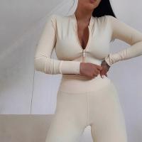China ladies stand Collar sportswear Long Sleeve Seamless Activewear front Zipper Tops And Yoga pants Set girls clothing for sale