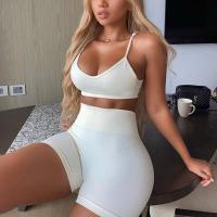 China New Sexy Back Sports Bra Gym Fitness Leggings Yoga Short Pants Sets For Women for sale