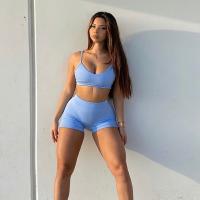 China New Sexy Back Sports Bra Gym Fitness Leggings Yoga Short Pants Sets For Women for sale