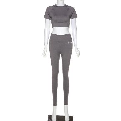 China Women Sportswear Fitness Wear Crop Top Yoga Shirts and pants Seamless Short Sleeve Top Gym Sports suits for sale