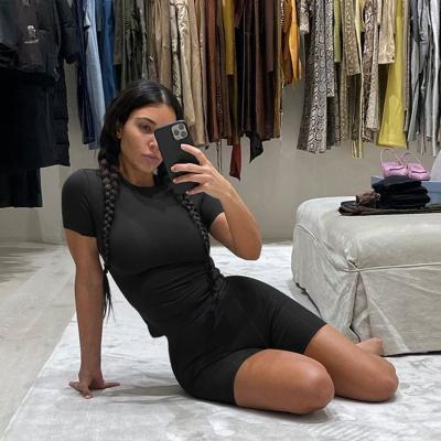 China ladies new short sleeve tops high waist two-piece yoga set tight buttocks-packed shorts solid color casual sportswear for sale