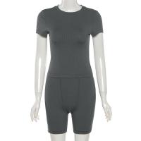 China ladies new short sleeve tops high waist two-piece yoga set tight buttocks-packed shorts solid color casual sportswear for sale