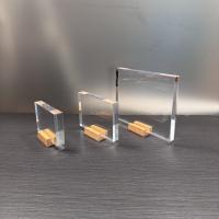 China Transparent Block Acrylic Stand With Wooden Base UV Printed And Customizable Size For Elegant Desktop Decor for sale