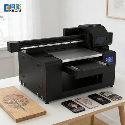 China KECAI A2 5060 High-Click UV Flatbed Inkjet Printer with Multiple Heads for Flex & Varnish Gold Packages Phone Cases for sale