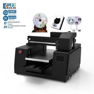 China KECAI 2026 Trending A3 Size Desktop Inkjet Printing Machine UV Flatbed Printer for Phone Case Glass PVC Card Ceramic Gift for sale