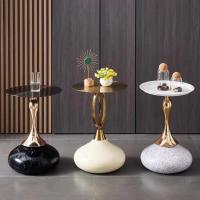 China Golden Stainless Steel Hotel Furniture Table With Lovely Round Base Rock Plate for sale