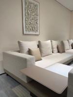 China Italian Minimalist Luxury Hotel Furniture Corner Living Room Large Sofa for sale