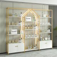 China Versatile Cosmetic Luxury Display Cabinets MultiLayer Marble Shelving Golden Body for sale