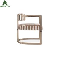 China Modern Luxury Hotel Furniture Golden Armchair Leisure Stainless Steel Brass Dining Chair for sale