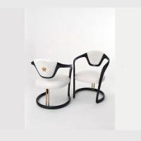 China Leather Stainless Steel Modern Armrest Dining Chair Luxury Versace Design for sale
