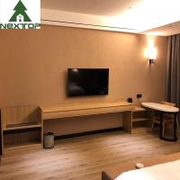 China 3 4 5 Star Luxury Wooden Bed With Nightstand Motel Hotel Resort Bedroom Furniture for sale