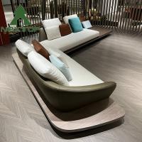 China 60D Sponge Deluxe Curved Sofa Set Furniture Italian Modern L Shape Leather Sofas for sale