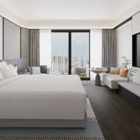 China Custom Walnut Wood Finish Hotel Bedroom Furniture King Guest Room Layout Full Set for sale