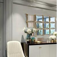 China 5 Star Hotel Light Luxury Style Metal Frame Wall Decorative Artistic Mirror for sale