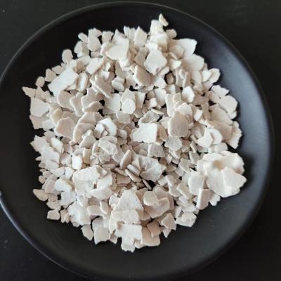 China Industrial Grade 74% Calcium Chloride Dihydrate Flakes for Water Treatment and Deicing for sale