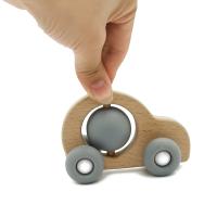 China Fun Educational Silicone Wood Easy Gripping Newborn Rattle for sale