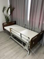 China Electric Home elderly nursing Bed with Lockable Wheels for sale