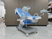 China (Premium Auto-Paper Dispensing Gynecological Bed - Electric Height/Trendelenburg Adjustment with Sterile Paper Roll) for sale