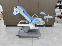 China (Premium Auto-Paper Dispensing Gynecological Bed - Electric Height/Trendelenburg Adjustment with Sterile Paper Roll) for sale