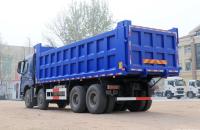 China Used HOWO 440hp 8X4 Dump Truck with 30 Tons Load Capacity and 7.6x2.35x1.5m Cargo Tank for sale