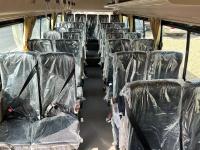 China 4435mm wheel base 2022 4*2 right hand used mini bus coaster 5 1 Manual gear box for sale