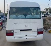 China Affordable Left Hand Drive Toyota Coaster Bus with 9.00R20 Tires and 113/5200 Max Power for sale