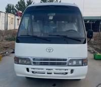 China Affordable Left Hand Drive Toyota Coaster Bus with 9.00R20 Tires and 113/5200 Max Power for sale