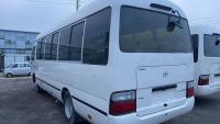 China Left Hand Drive Toyota Coaster Bus at with 9.00R20 Tires and 4L Engine Capacity for sale