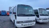 China Left Hand Drive Toyota Coaster Bus at with 9.00R20 Tires and 4L Engine Capacity for sale