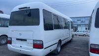 China Left Hand Drive Toyota Coaster Bus at with 9.00R20 Tires and 4L Engine Capacity for sale