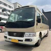China 30 Seater Toyota Coaster Mini Bus with Left Drive Manual Transmission and Materials for sale