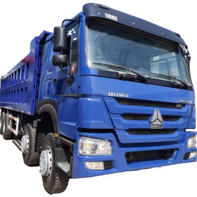 China 7300*2300*1500 Cargo Tank Used HOWO 8X4 Heavy-duty Dump Truck RHD Diesel Tipper Truck for sale