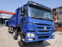 China 7300*2300*1500 Cargo Tank Used HOWO 8X4 Heavy-duty Dump Truck RHD Diesel Tipper Truck for sale