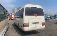 China Tire 7.00R16 Toyota Coaster 29 Seats Sliding Windows Bus with Manual Transmission for sale