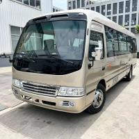 China Customer's Requirement Left Hand Drive Coaster Bus with 85L Oil Tank for sale