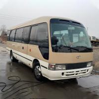 China Manual Transmission Type Used Toyota Coaster Bus with 3300mm Wheel Base and 30 Seats for sale