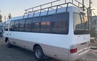 China 8500kg Total Mass Used Coaster Bus with Overhead Luggage Rack and 4-6L Engine Capacity for sale