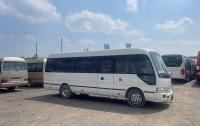 China 3935mm Wheel Base Toyota Coaster Bus with 19-29 Seats Closing Windows Sliding Doors for sale