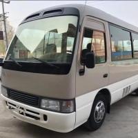 China Max Torque 340Nm/rpm Diesel 29 Seats Used Toyota Coaster Buses with 300L Oil Tank for sale