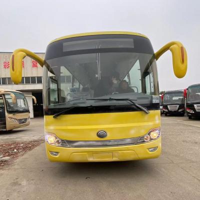 China Tourist Luxury Bus with Toilet Suspension Leaf Spring and 70 Seater Capacity for sale