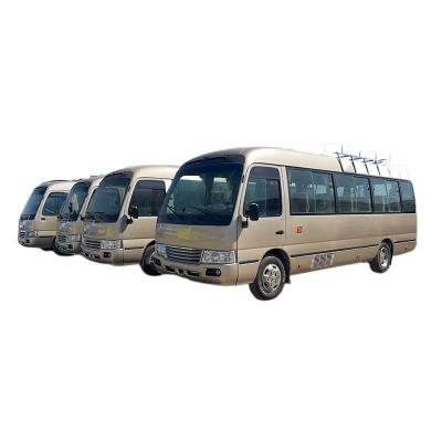 China 15BFT Engine Powered 4 Cylinders Toyo ta Coaster Bus with 6990*2025*2650mm Dimensions for sale