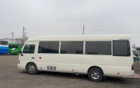 China 7m 30 Seater Used Toyota Coaster Bus with Manual Transmission and 7725x2000x2600 Dimensions for sale