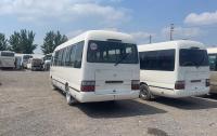 China 30-Seater Toyo ta Coaster Bus with 9.00R20 Tires and Comfortable Seating Capacity for sale