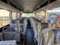China Comfortable 65 Seater Bus Coach with 6 8L Engine Capacity and Leaf Spring Suspension for sale