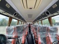China 47 Seater Luxury Diesel Travel Coach Bus with High Engine Capacity and Comfortable Seats for sale