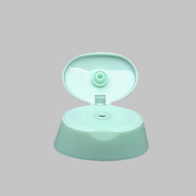 China Oval Flat Flip Top Cap For Shampoo Bottle Double Layer Flip Cap For Shower Gel Bottle for sale