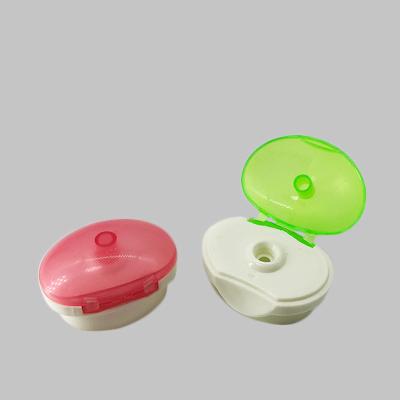 China Plastic PP 22mm Neck Size Oval Shape Double Color Flip Top Caps For Shampoo Bottles for sale